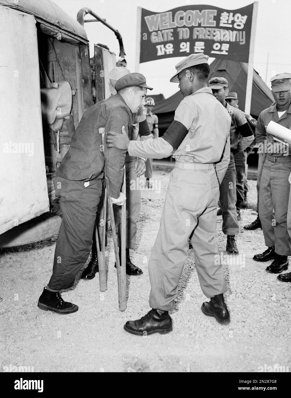 U.S. Air Force Lt. Col. Thomas D. Harrison of Clovis, N.M., hobbles ...