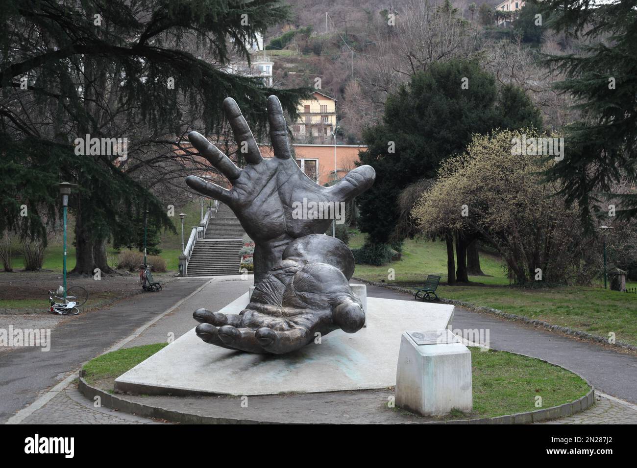 Giant hands statue artwork at an empty square Infront of a European ...
