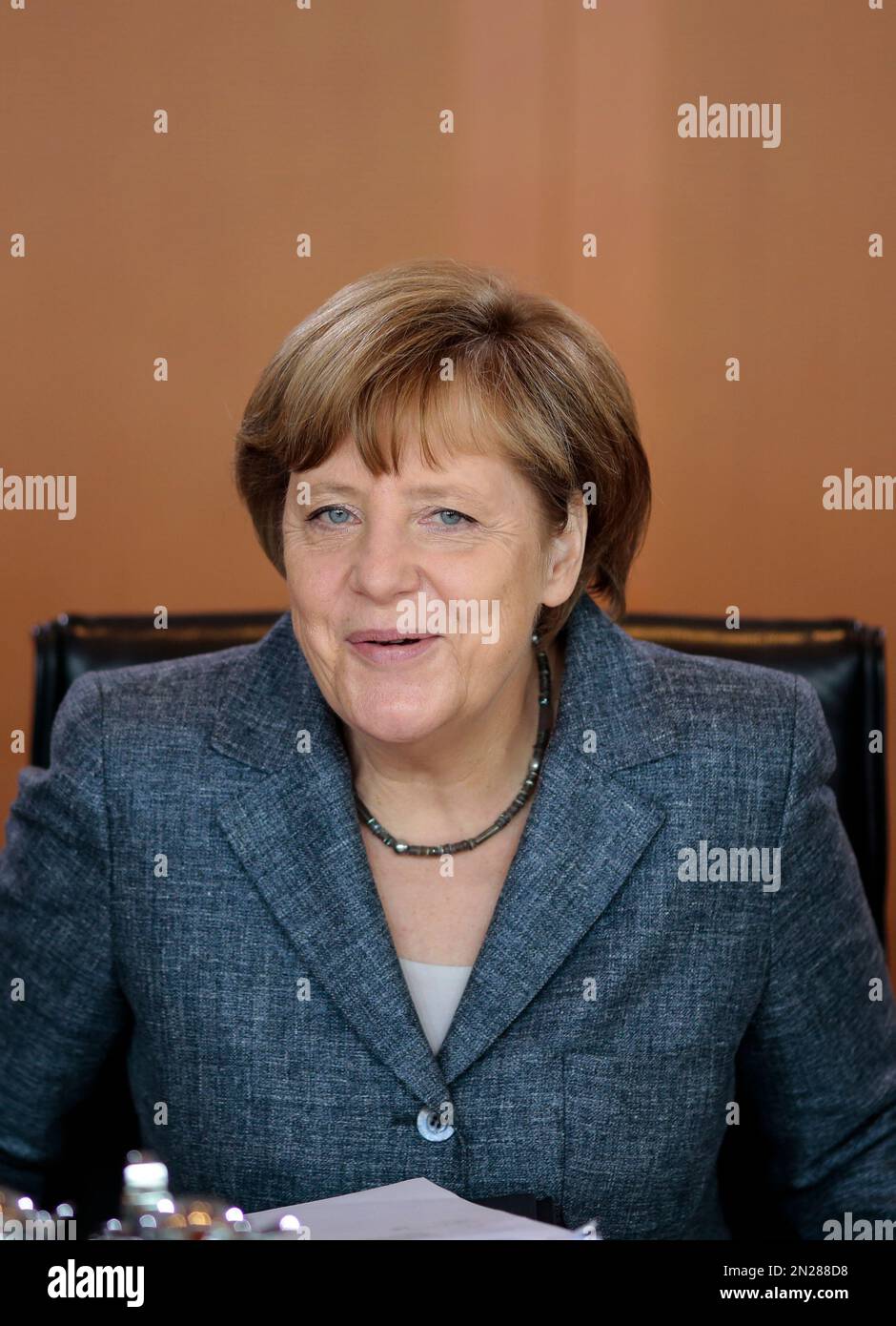 German Chancellor Angela Merkel smiles after she arrived for the German ...