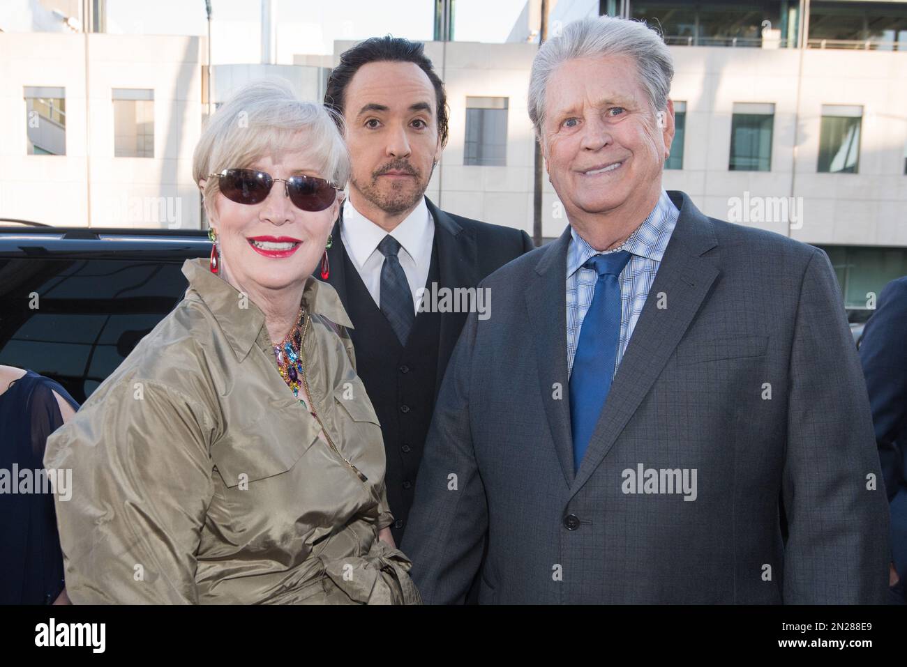 Melinda Ledbetter, from left, John Cusack and Brian Wilson arrives at ...