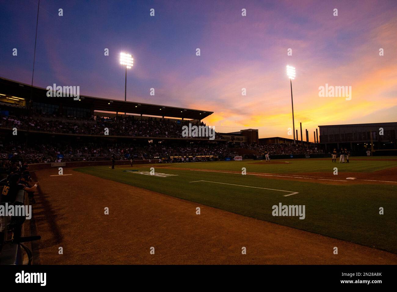 Sunset view of Blue Bell Park, Texas A&M on the field against ...