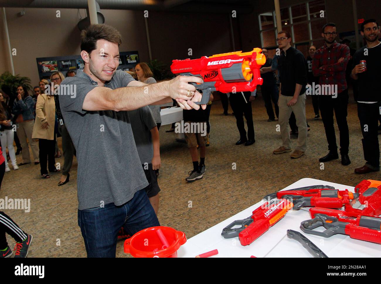 Trick shot YouTube stars Dude Perfect member Cory Cotton shoots a NERF ...