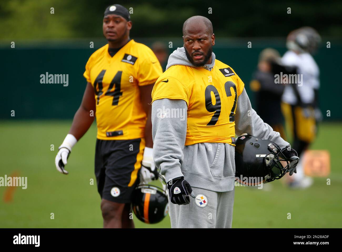 Pittsburgh Steelers linebackers James Harrison (92) and Howard Jones ...