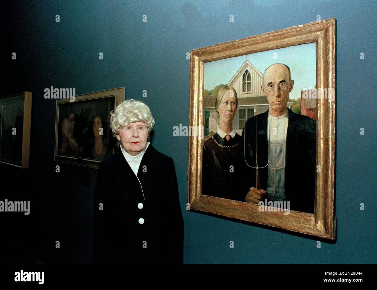 Nan Wood Graham, 83, poses next to the painting "American Gothic ...