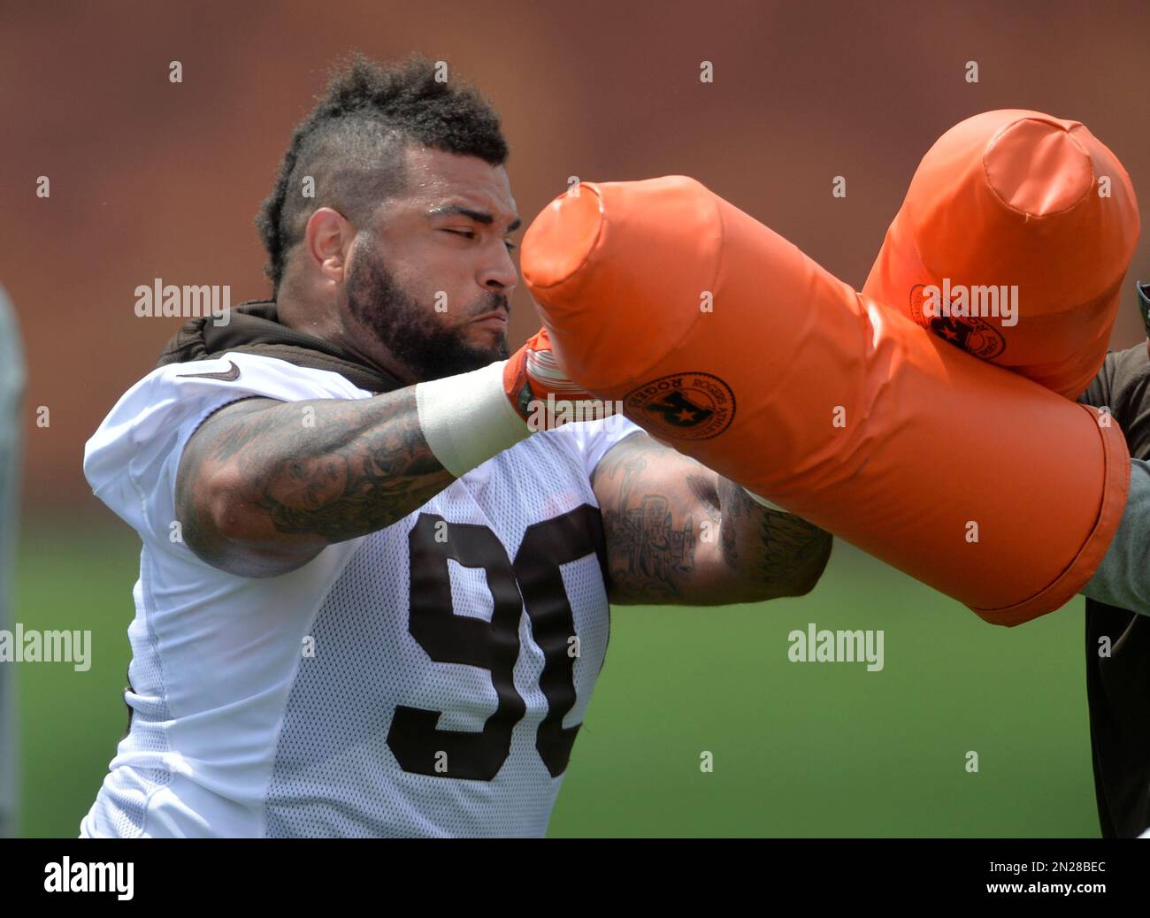 Cleveland Browns defensive lineman Billy Winn (90) participates in an ...