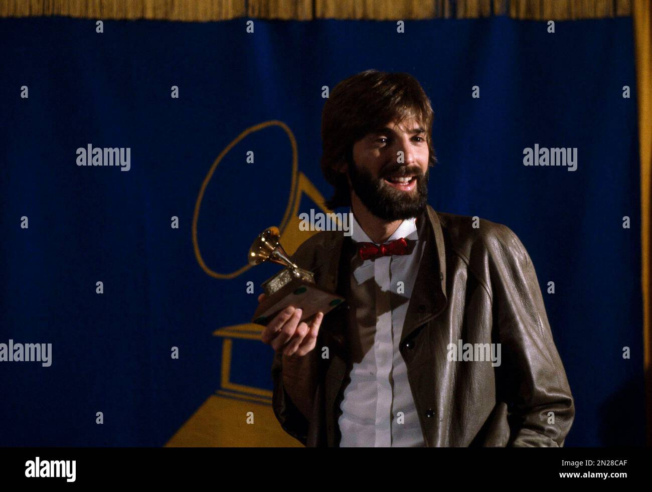 Singer-songwriter Kenny Loggins holds his Grammy Award at Radio City ...
