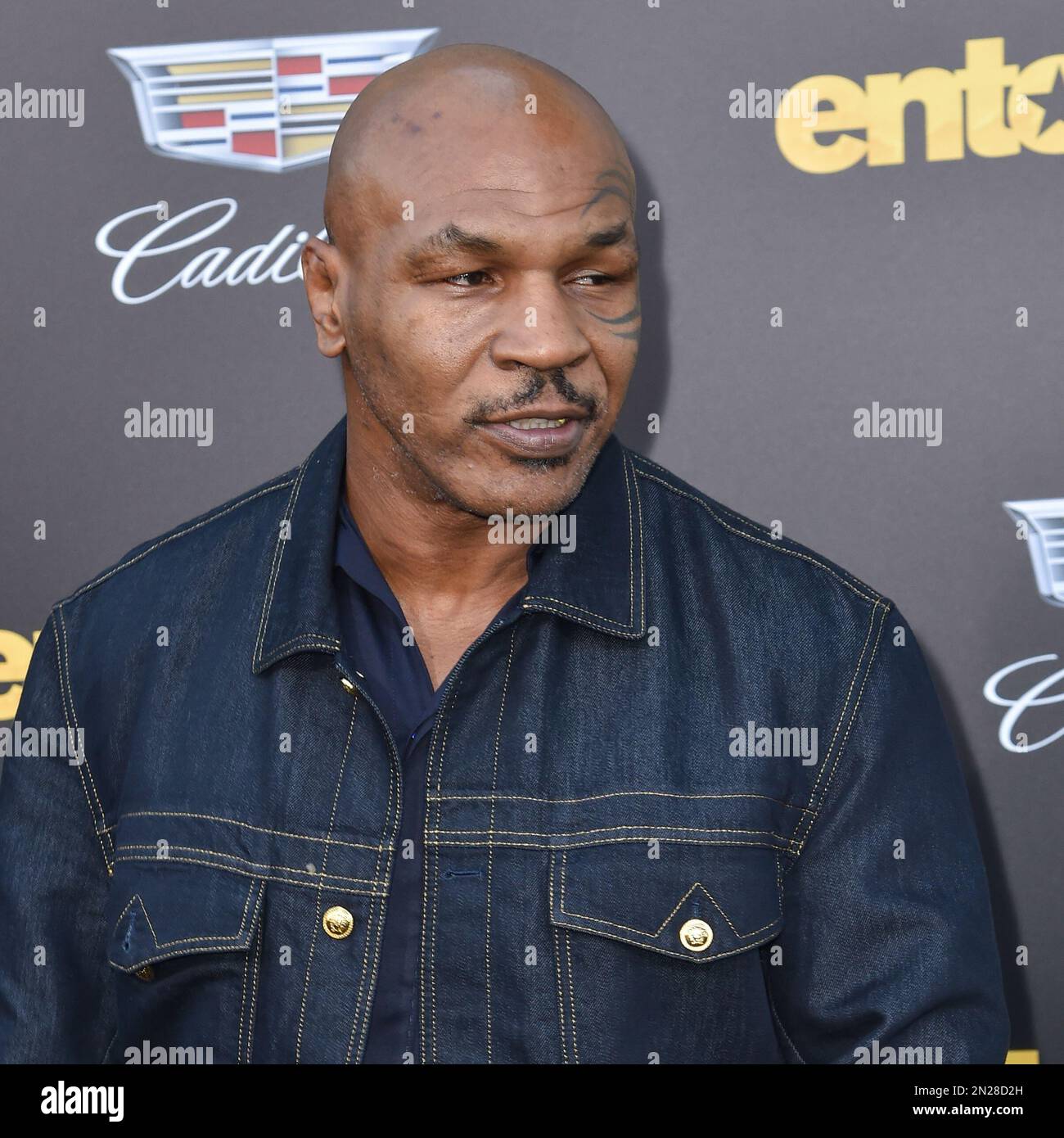 Mike Tyson arrives at the LA Premiere Of "Entourage" at the Regency ...