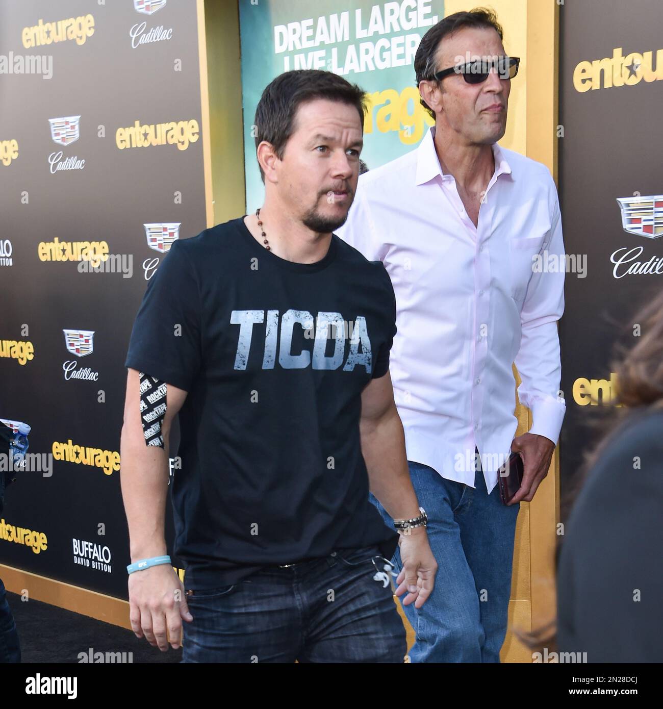 Mark Wahlberg, left and Johnny Alves arrive at the LA Premiere Of ...
