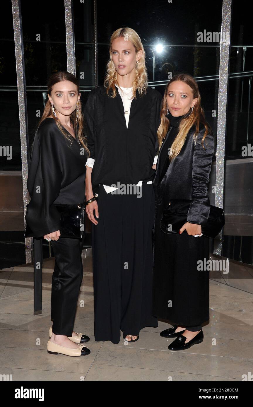 From left, Ashley Olsen, Aymeline Valade and Mary-Kate attend the 2015 ...