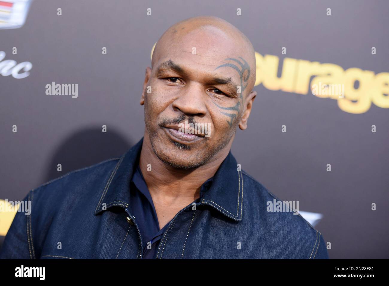 Mike Tyson arrives at the Los Angeles premiere of "Entourage" at the ...