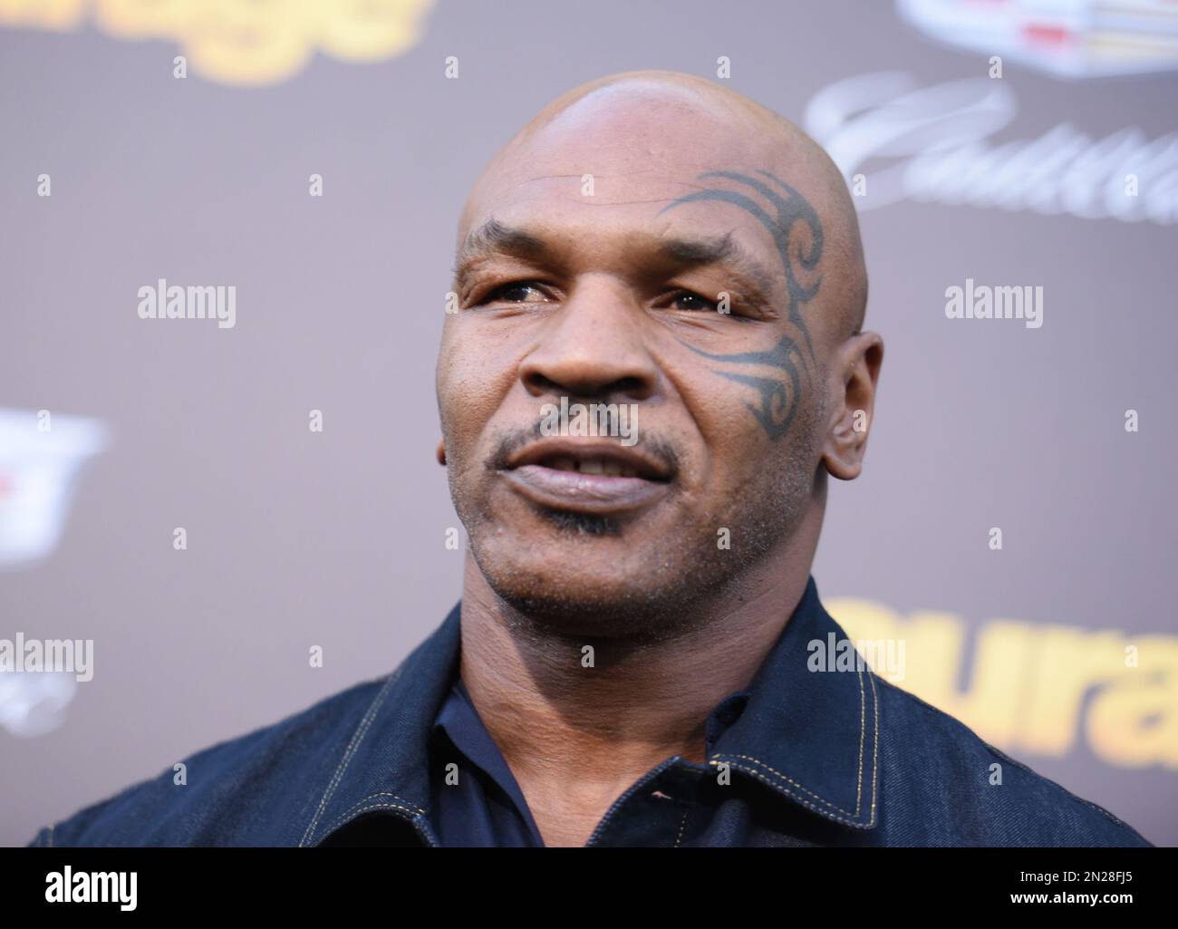 Mike Tyson arrives at the Los Angeles premiere of "Entourage" at the ...