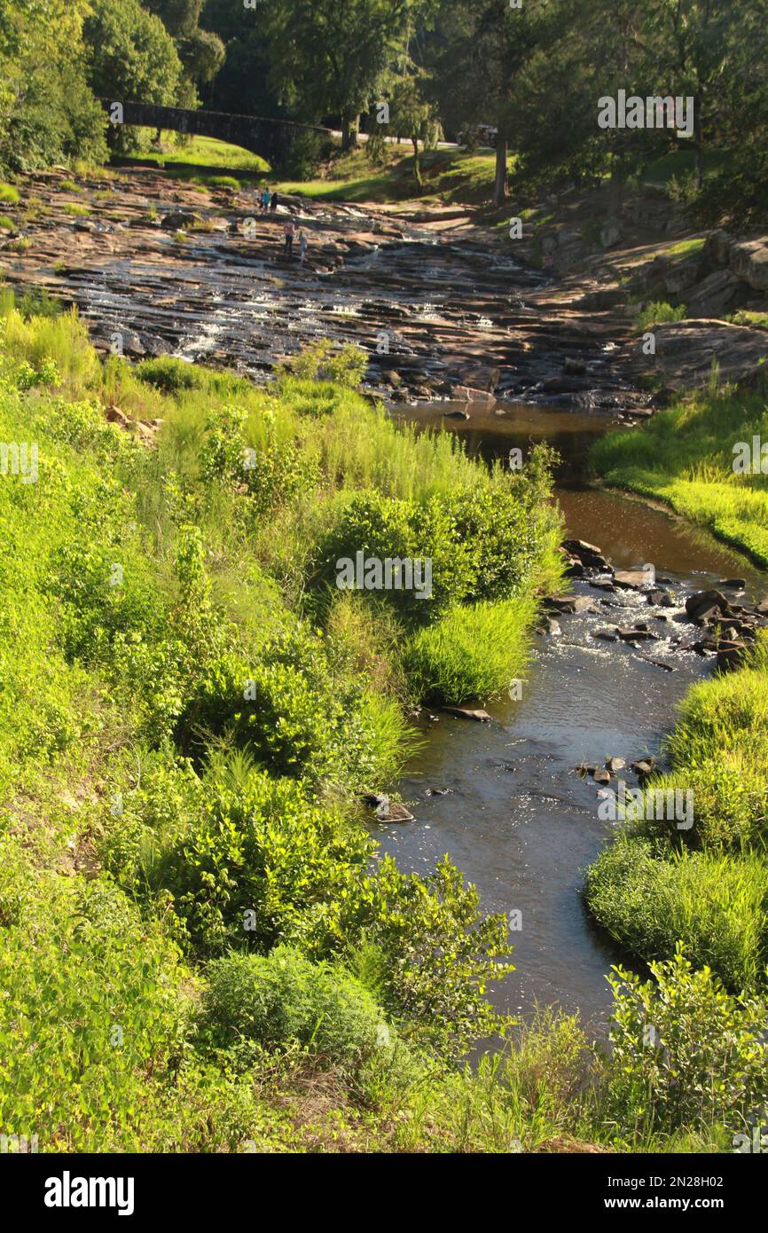 The water cascading down over boulders at Indian Springs State Park, GA ...