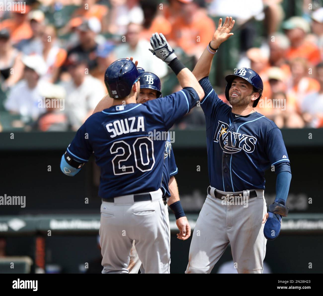 Tampa Bay Rays David DeJesus, right, and Logan Forsythe, partially ...