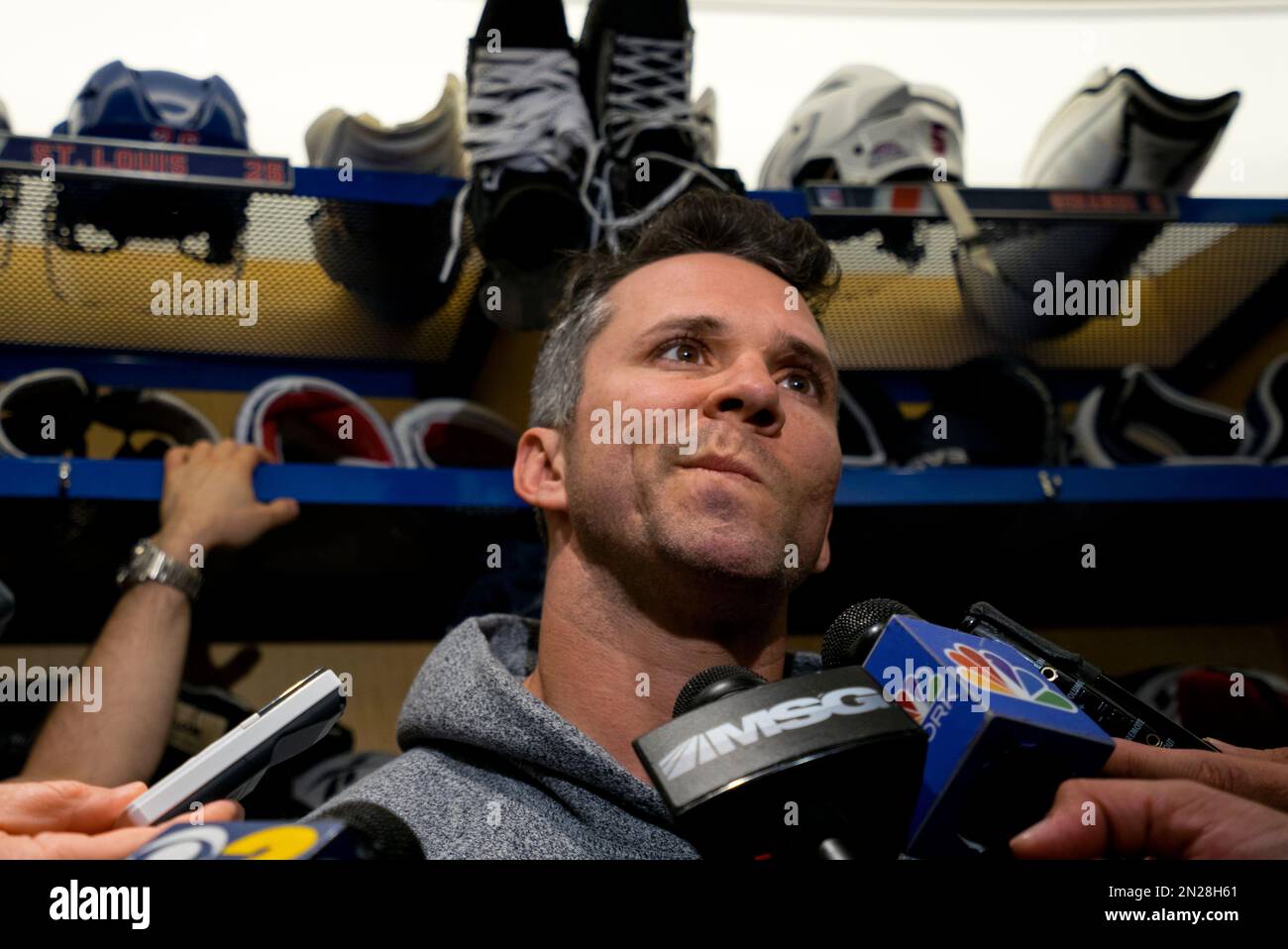 New York Rangers Martin St. Louis speaks in the locker room at the team ...