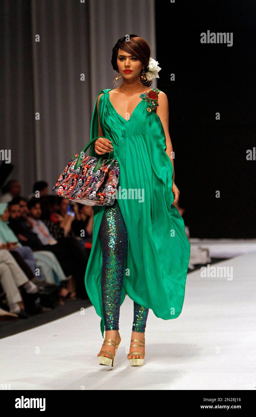 In this April 11, 2013 photo, Pakistan's top model, Ayaan Ali, models on a catwalk during a ...