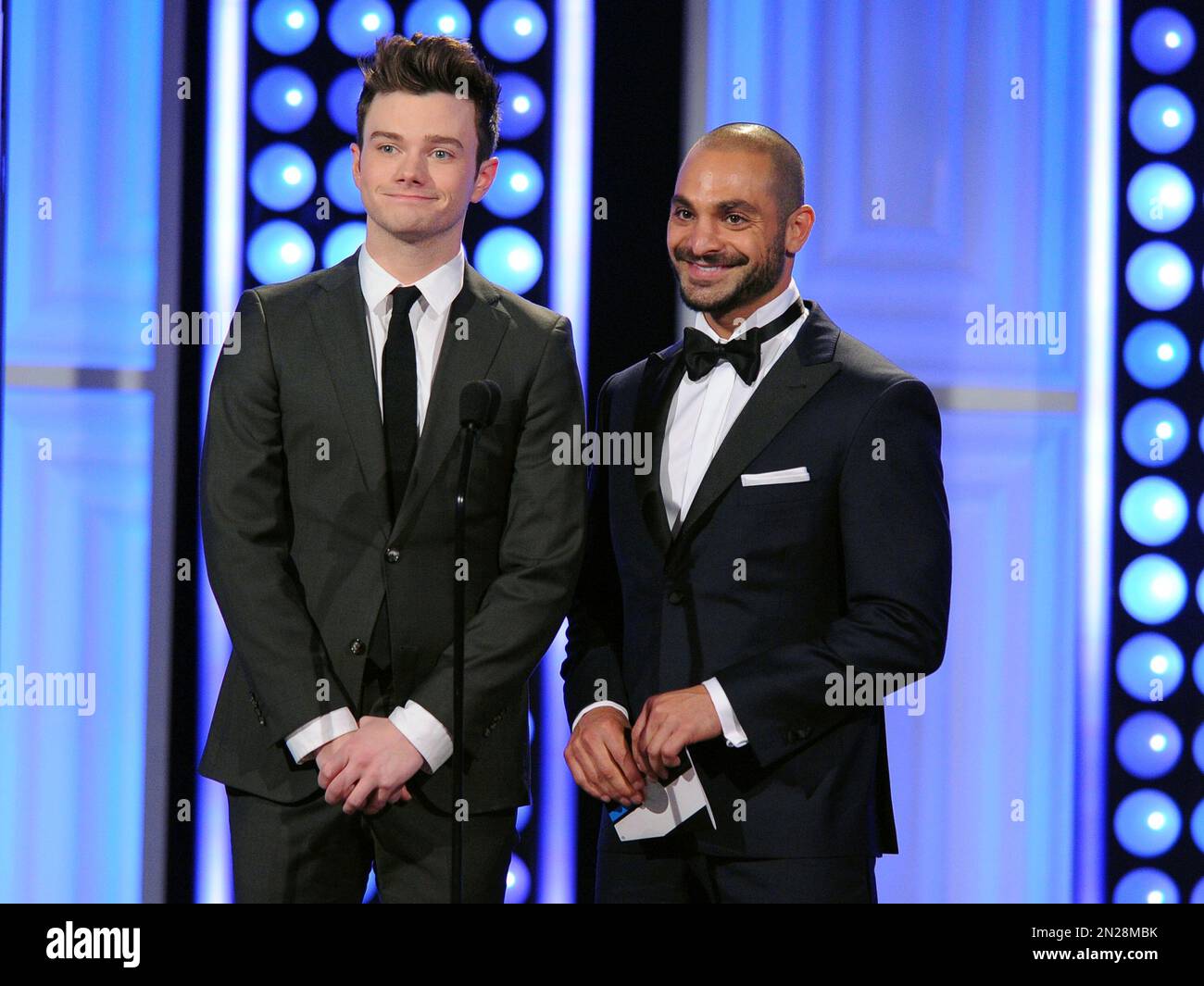 Chris Colfer, left, and Michael Mando present the award for best ...