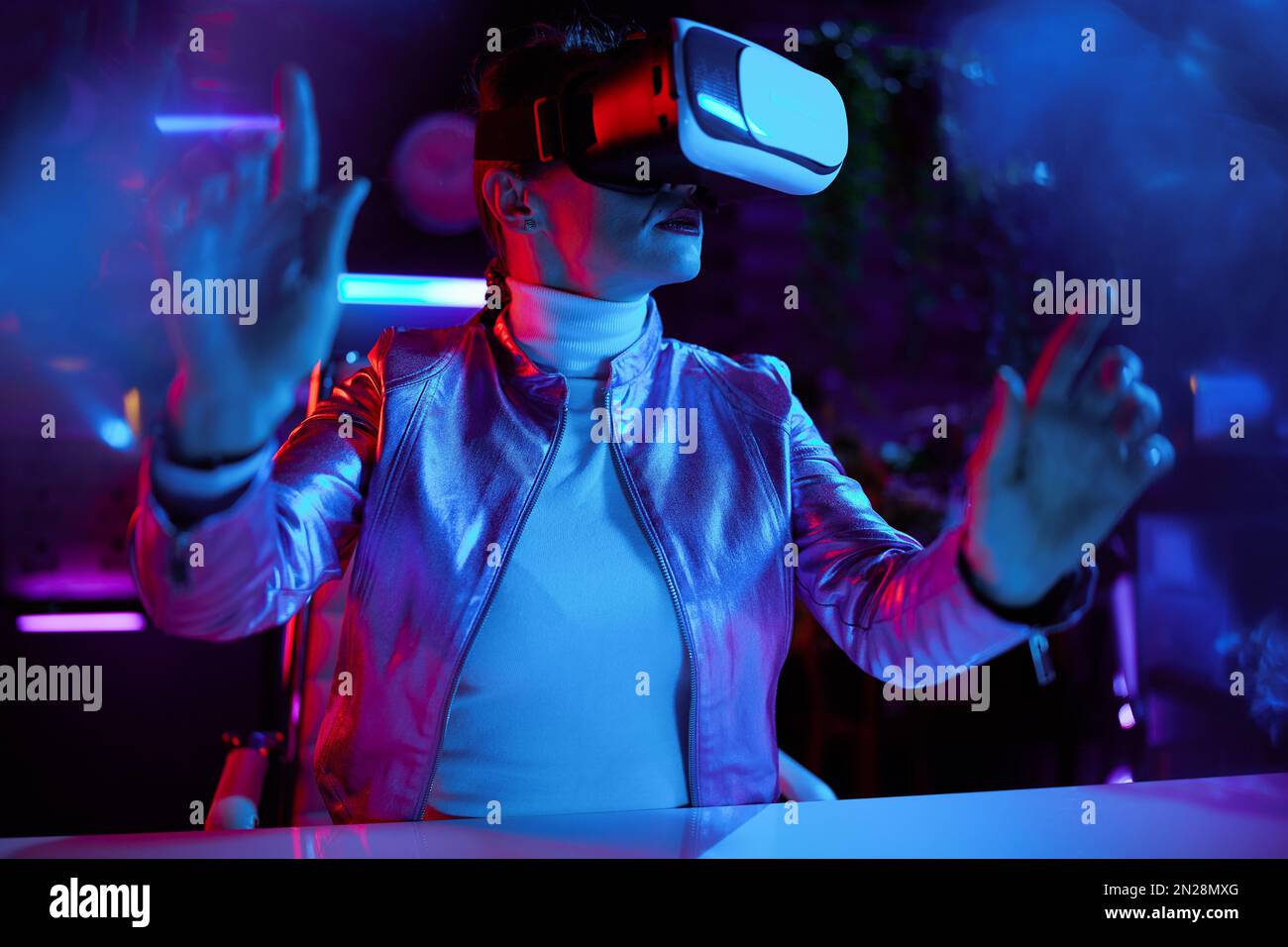 Neon metaverse futuristic concept. stylish business woman in vr headset ...