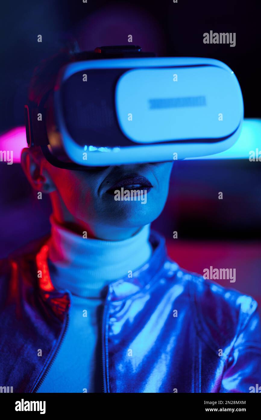 Neon metaverse futuristic concept. Portrait of stylish business woman ...