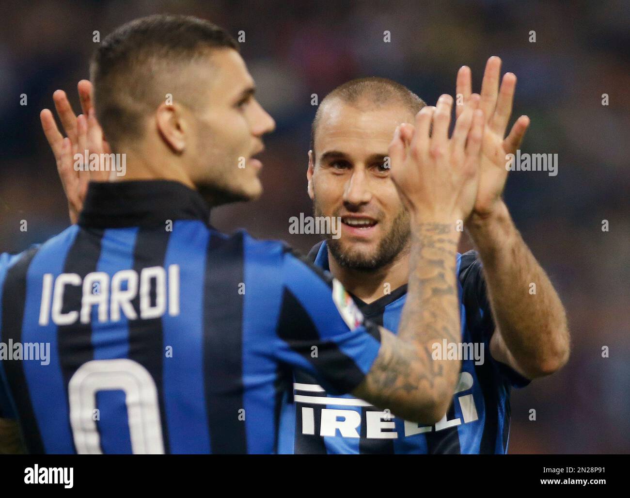 Inter Milan's Rodrigo Palacio, right, celebrates with his teammate ...