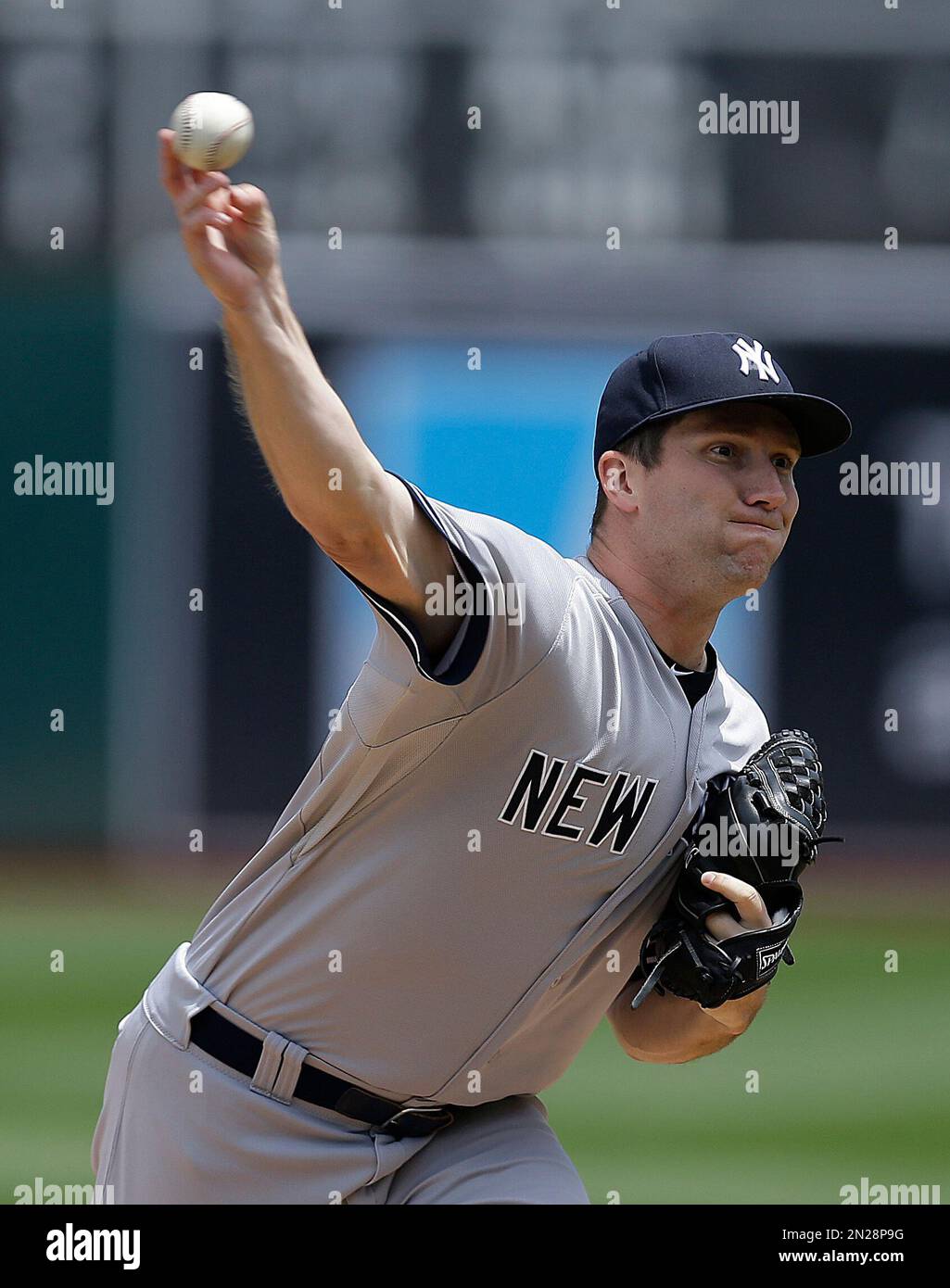 New York Yankees' Adam Warren works against the Oakland Athletics in ...