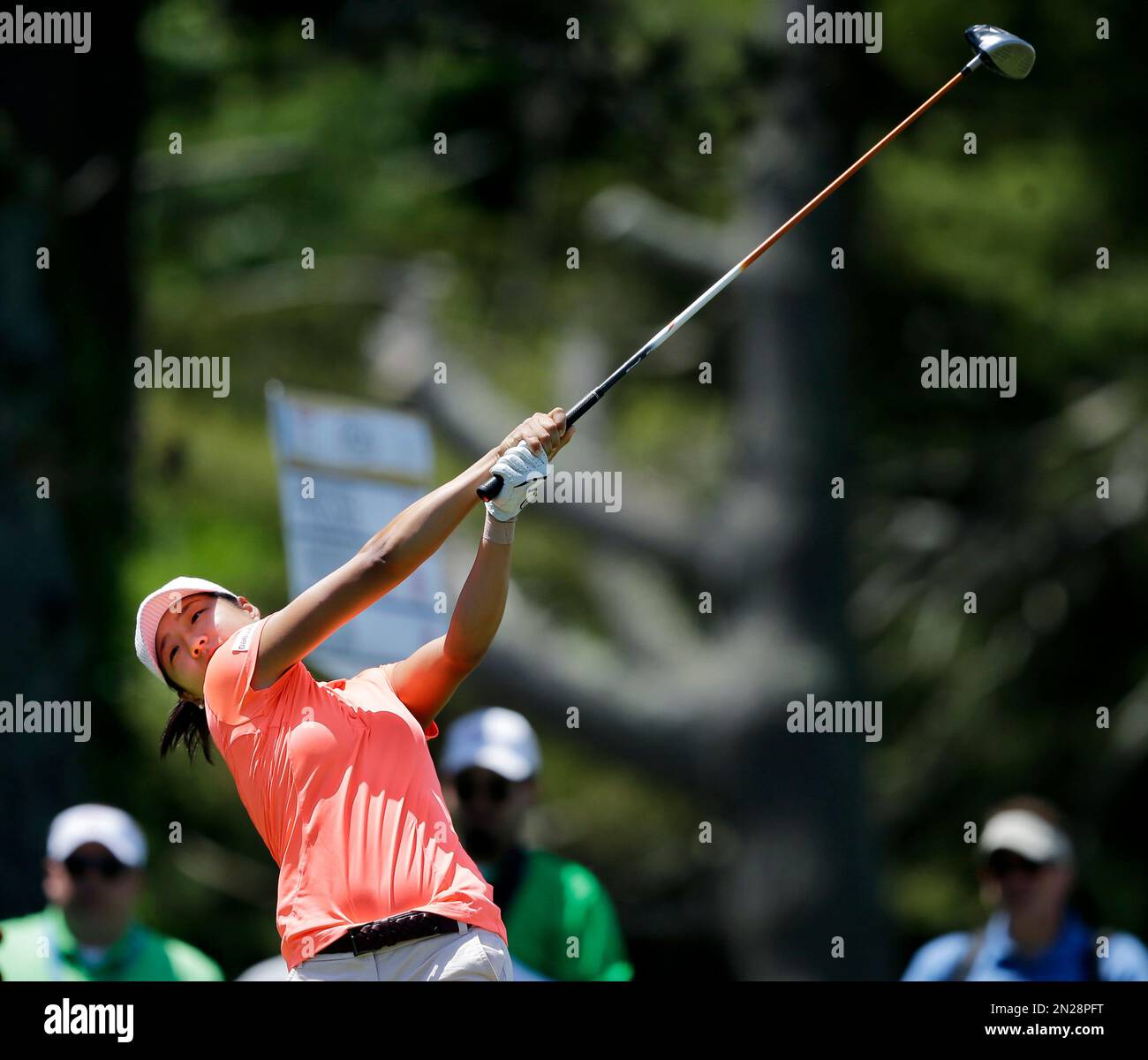 Kelly W. Shon hits a tee shot on the second hole during the final round ...