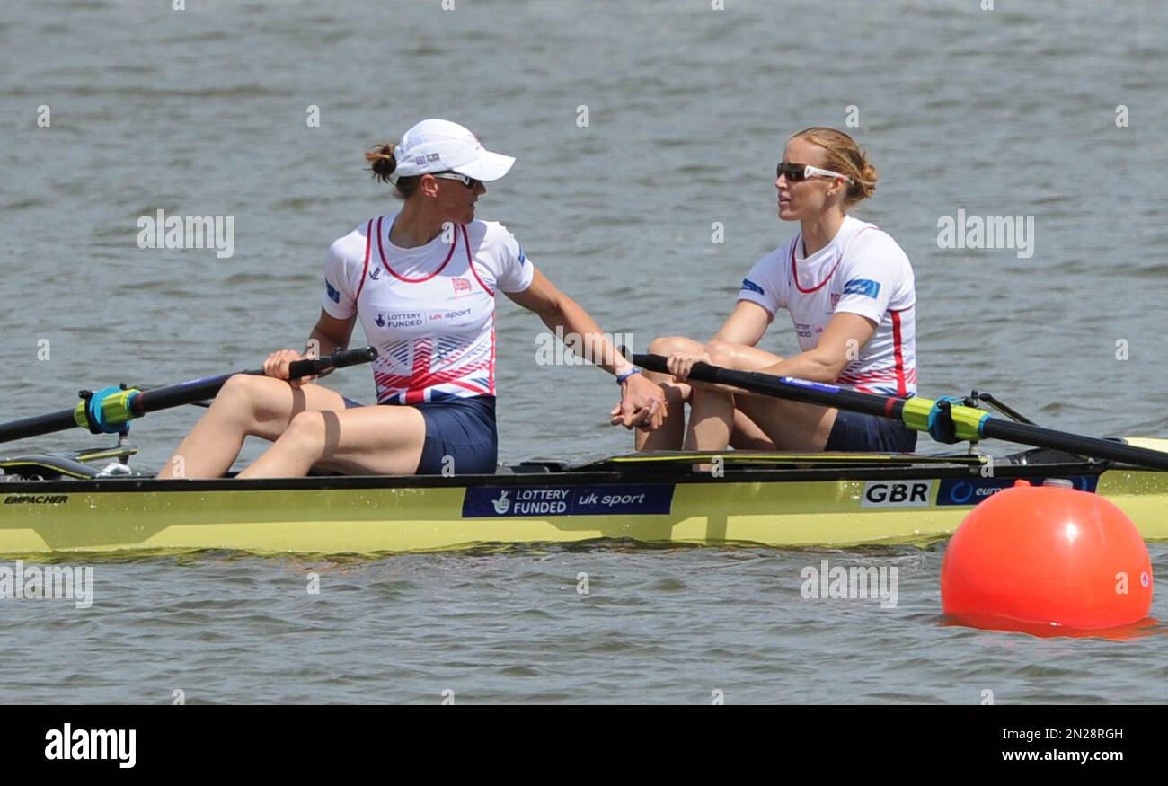 Great Britain's Heather Stanning, left, and Helen Glover shake hands as ...