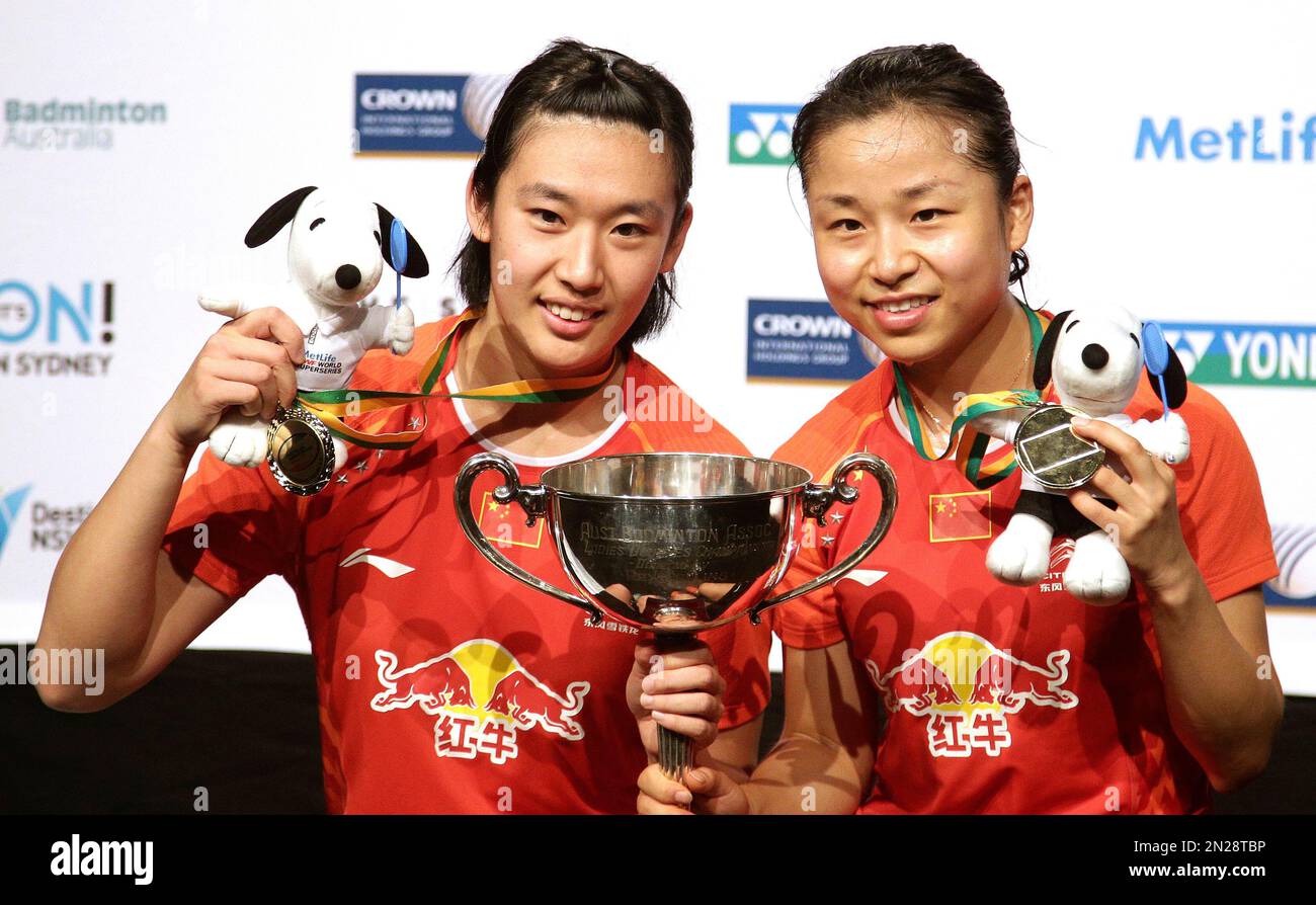 Tang Yuanting, left, and Ma Jin of China pose for a photo with their trophy and medals after ...
