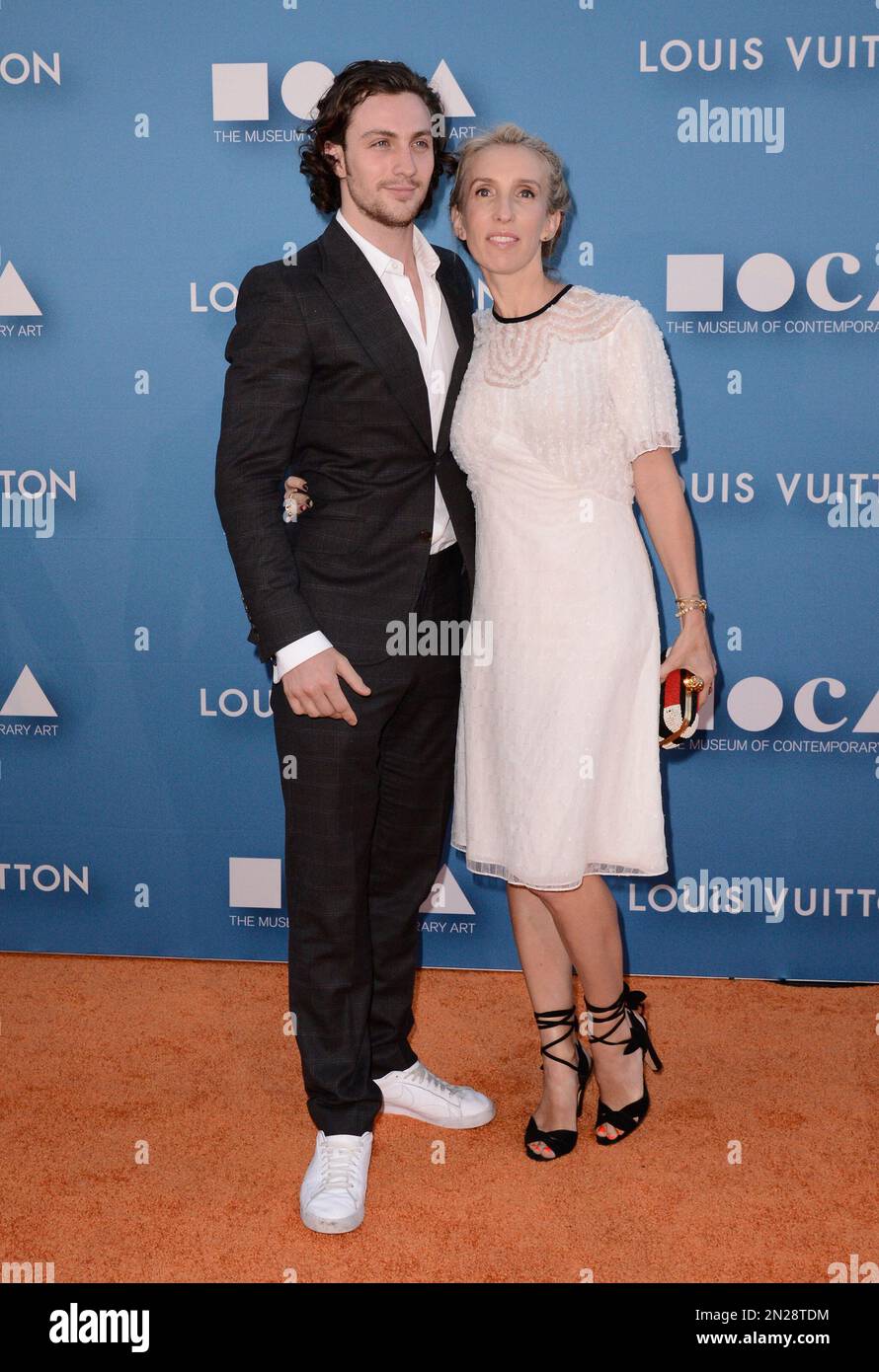 Actor Aaron Taylor-Johnson, left, and director Sam Taylor-Johnson ...