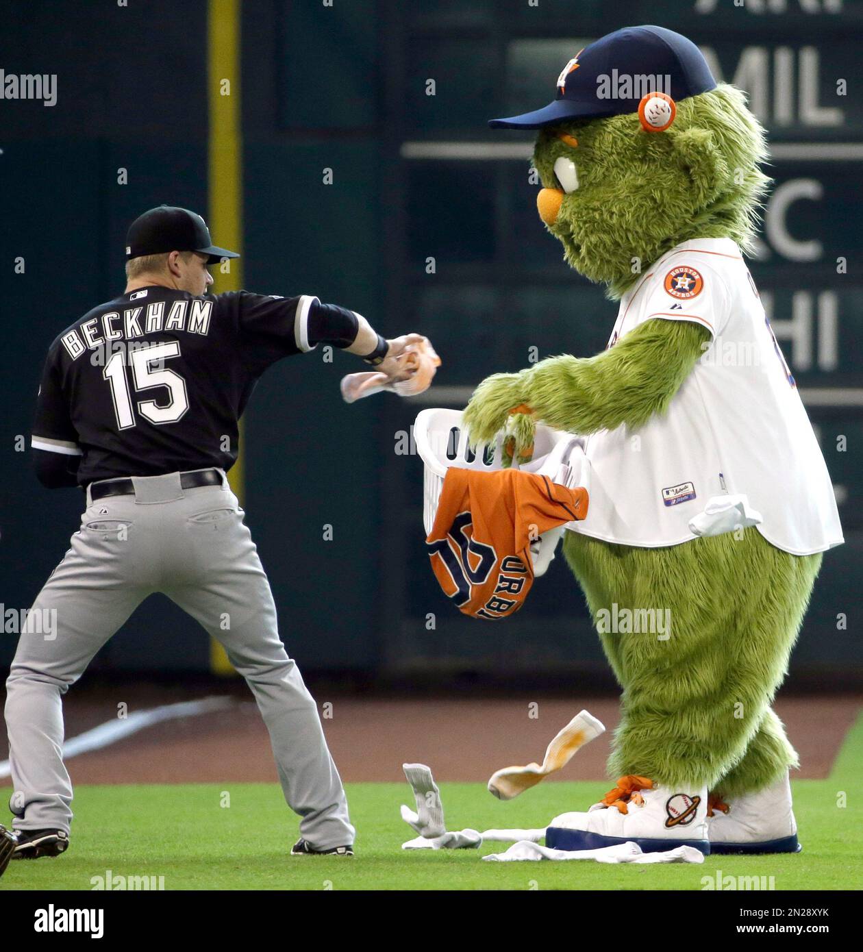 Chicago White Sox's Gordon Beckham (15) tosses socks toward Houston ...