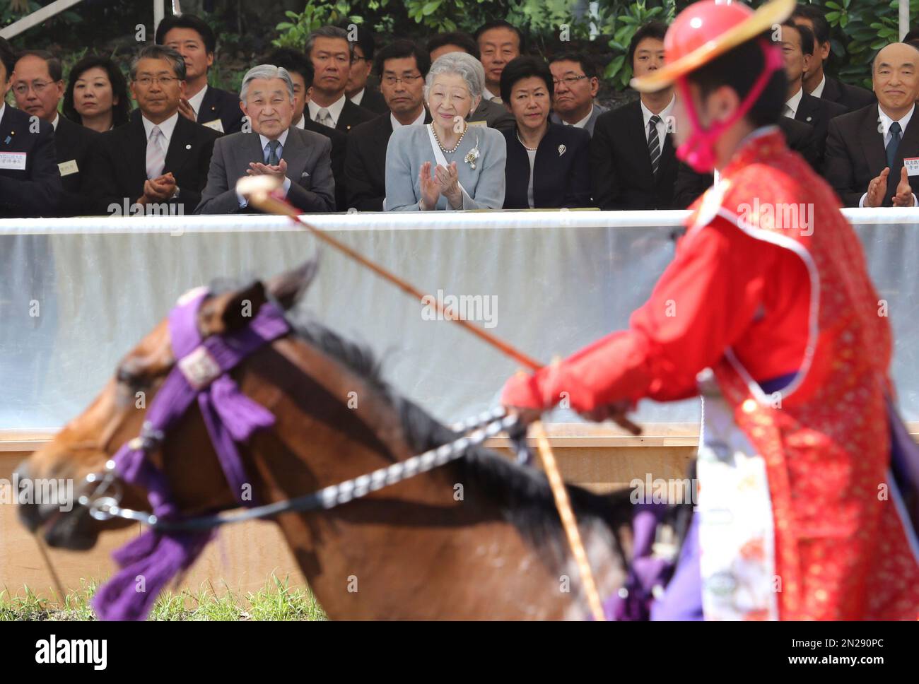 Japanese Emperor Akihito, fourth from left, and Empress Michiko, center ...