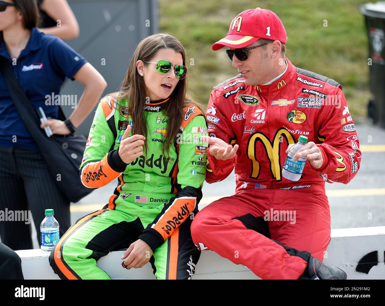 Danica Patrick, left, talks with Jamie McMurray, right, before ...