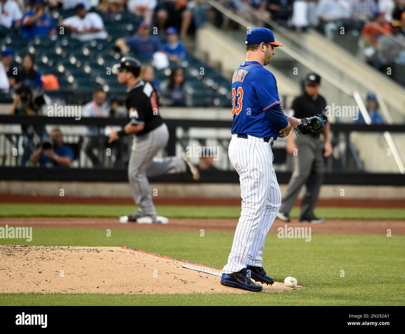 New York Mets starting pitcher Matt Harvey (33) reacts on the mound as ...