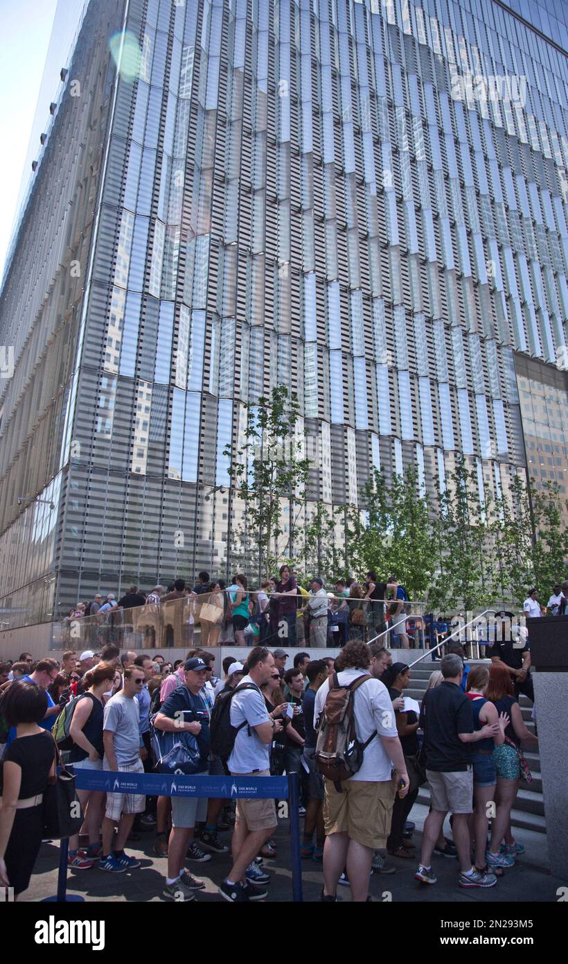 Visitors stand in line to purchase tickets to the One World Observatory ...