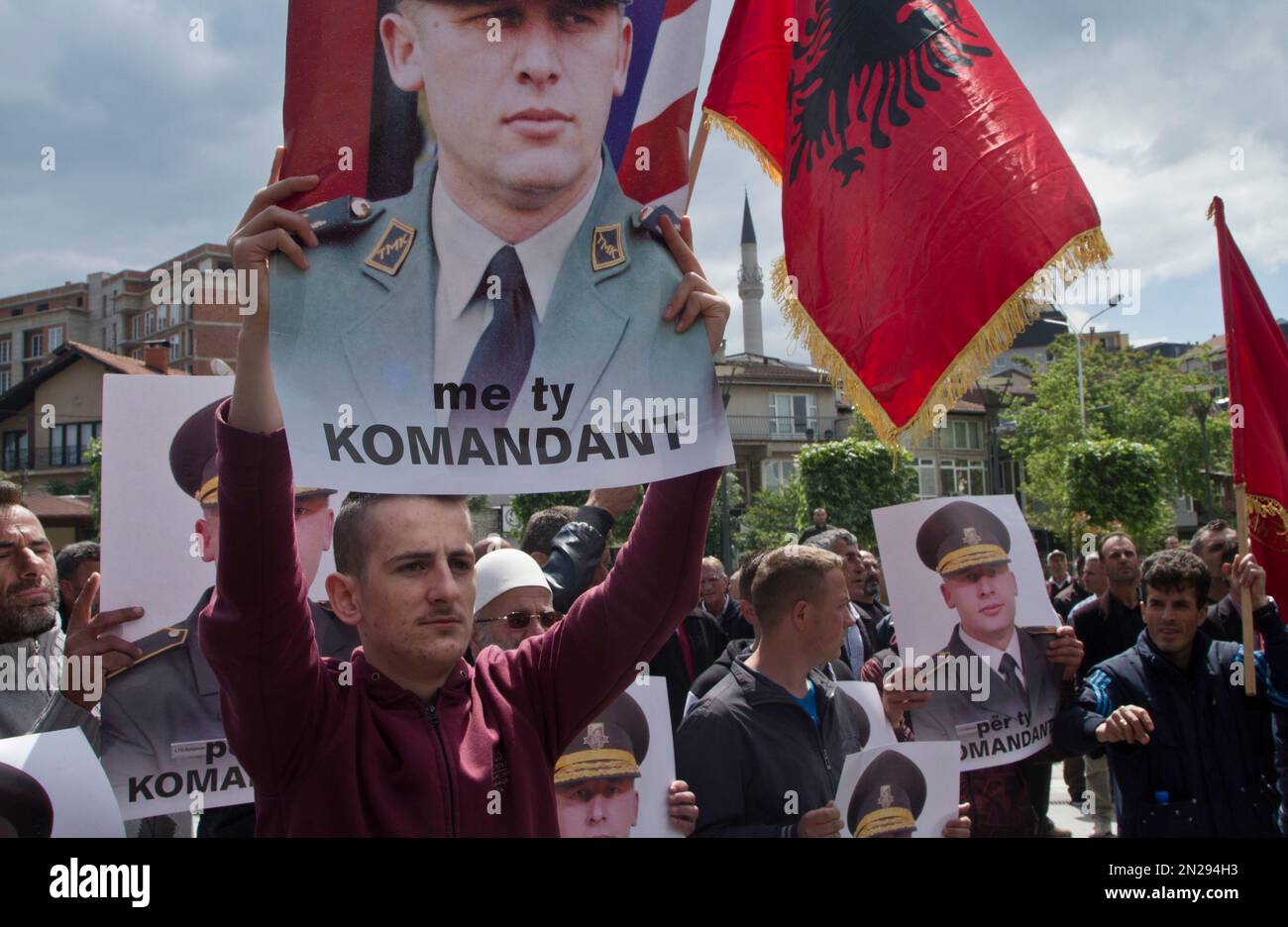 Ethnic Albanians hold photos of former guerrilla commander Sylejman ...
