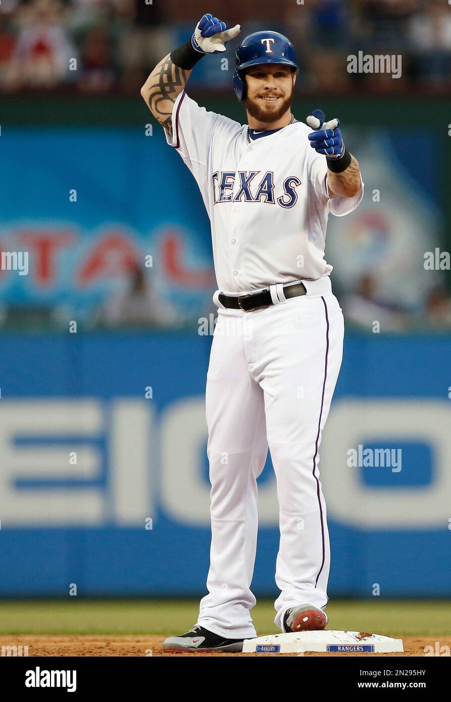 Texas Rangers Josh Hamilton celebrates hitting a double during the ...