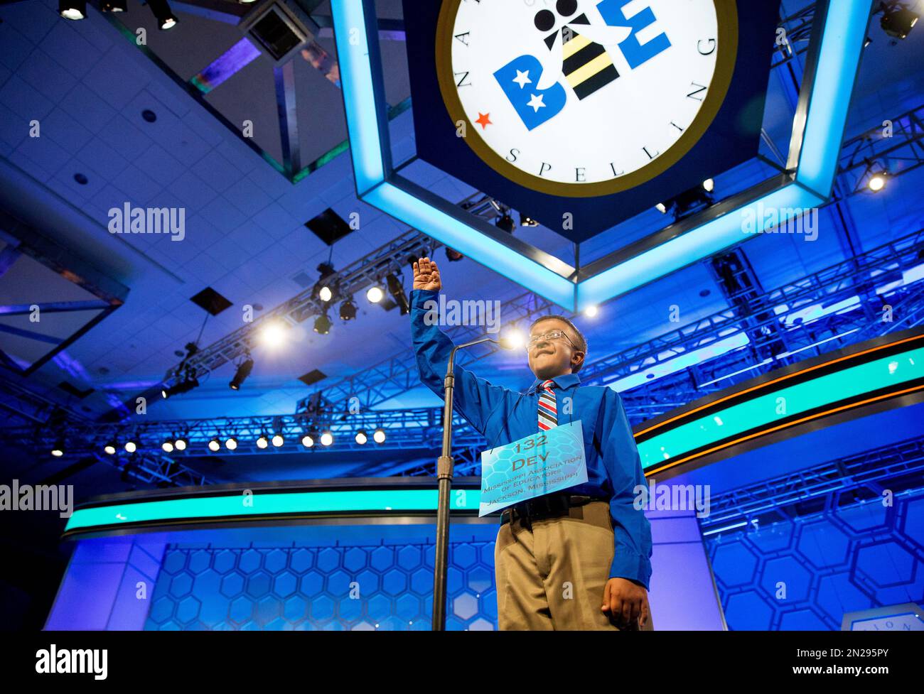 Dev Jaiswal, 13, of Jackson, Miss., salutes to the audience after ...