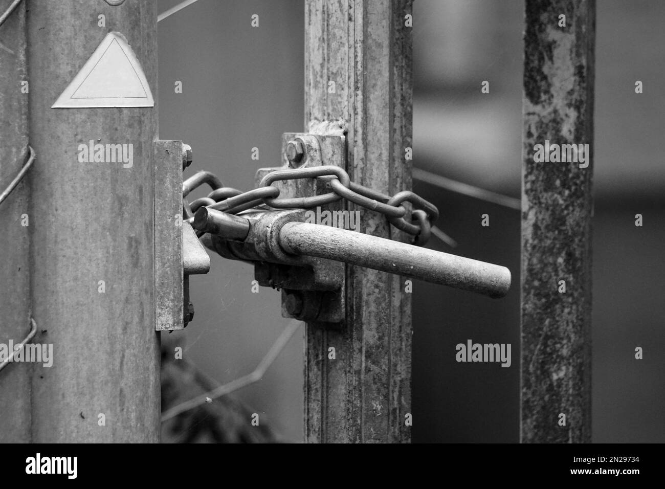 Padlock on gate close Black and White Stock Photos & Images - Alamy