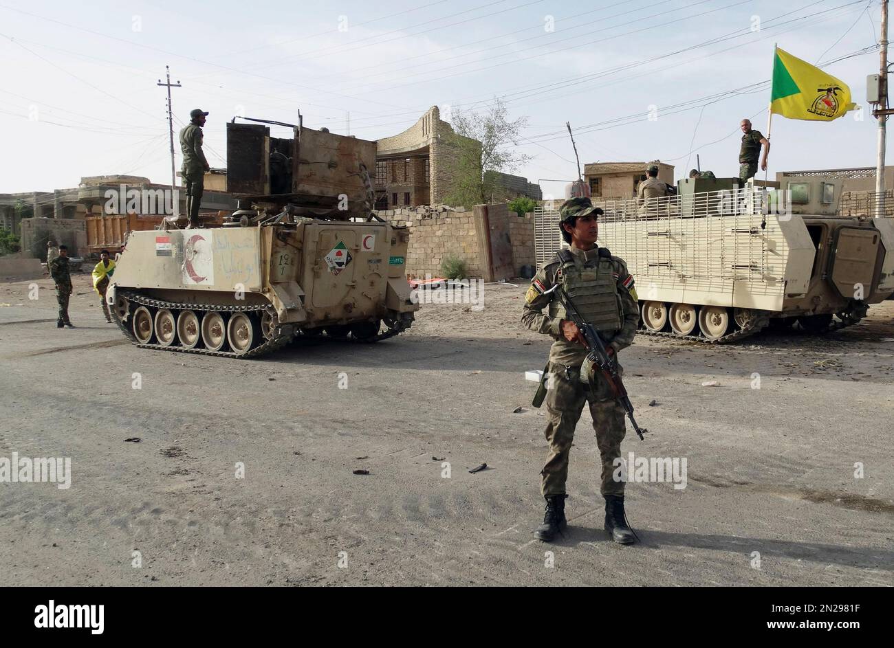 In this Wednesday, May 27, 2015, Iraqi Shiite Hezbollah Brigade ...