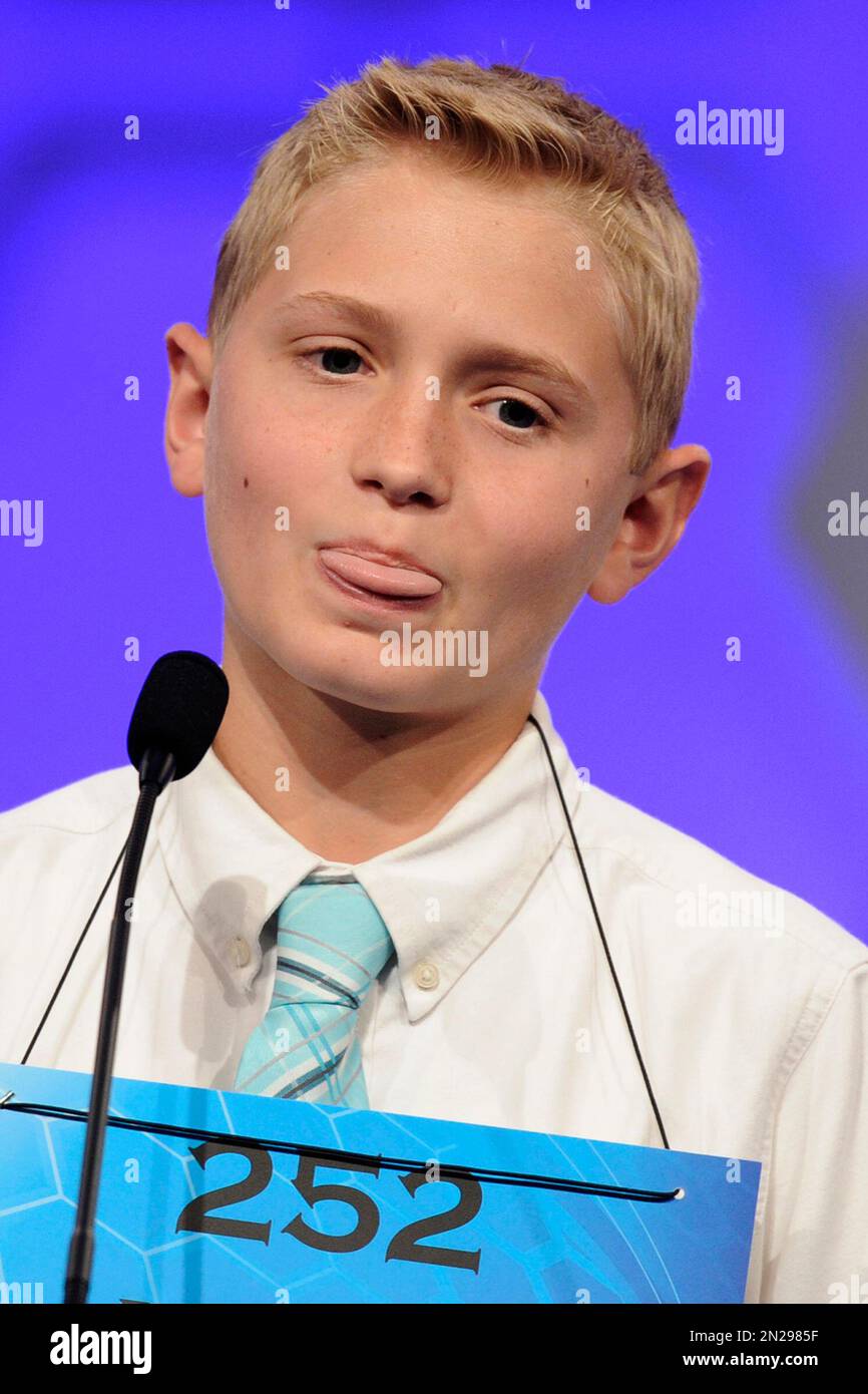 James Bryner, 13, of Price, Utah, sticks out his tongue after miss ...
