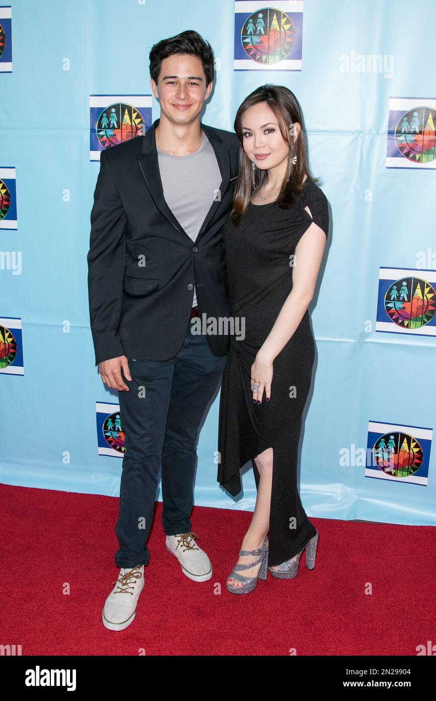 Ivan Dorschner, left, and Anna Perez De Tagle arrive at the Let's ...