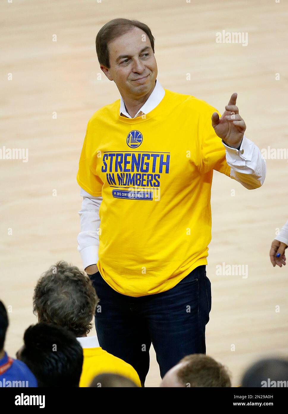 Golden State Warriors owner Joe Lacob gestures during the first half of ...