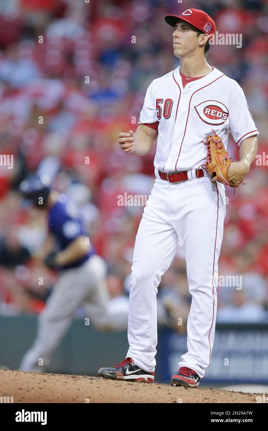 Cincinnati Reds pitcher Michael Lorenzen reacts after giving up a solo ...