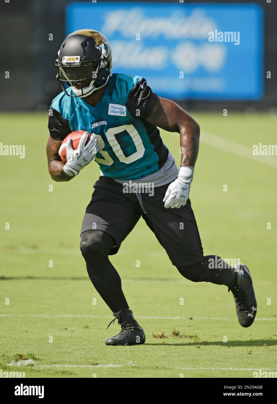 Jacksonville Jaguars running back Bernard Pierce runs through a drill ...