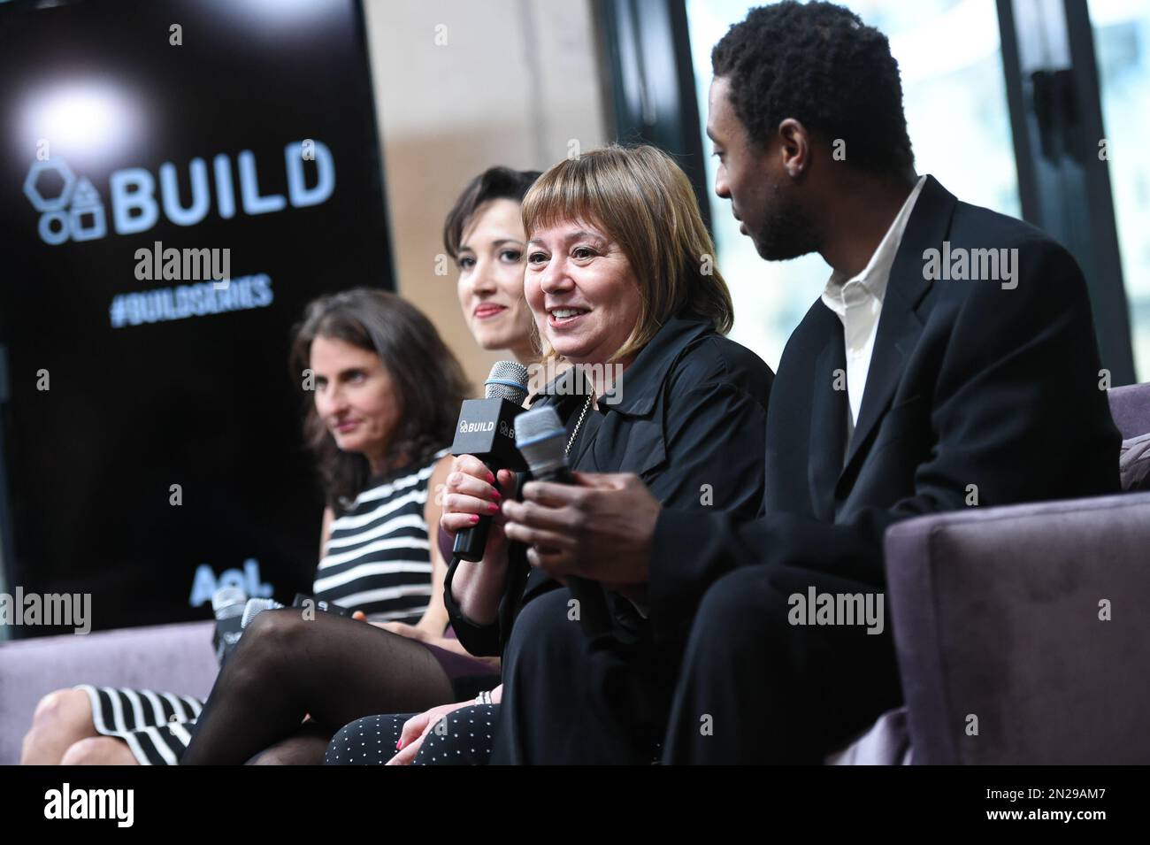 Gail Dines, center, participates in AOL's BUILD Speaker Series to ...