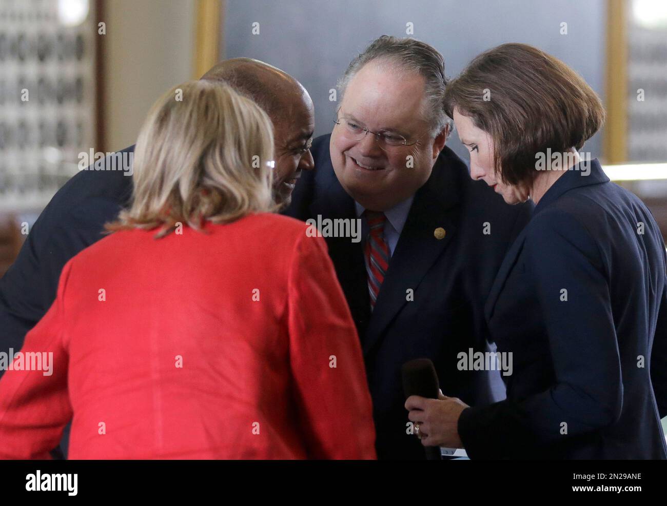 Texas Sen. Craig Estes, R-Wichita Falls, second from right, visits with ...