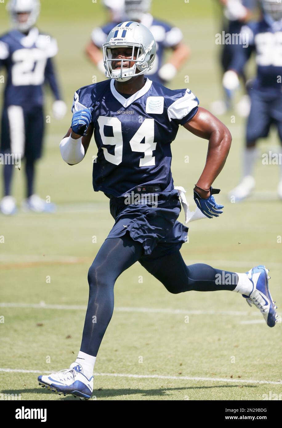 Dallas Cowboys defensive end Randy Gregory runs a drill during an NFL ...