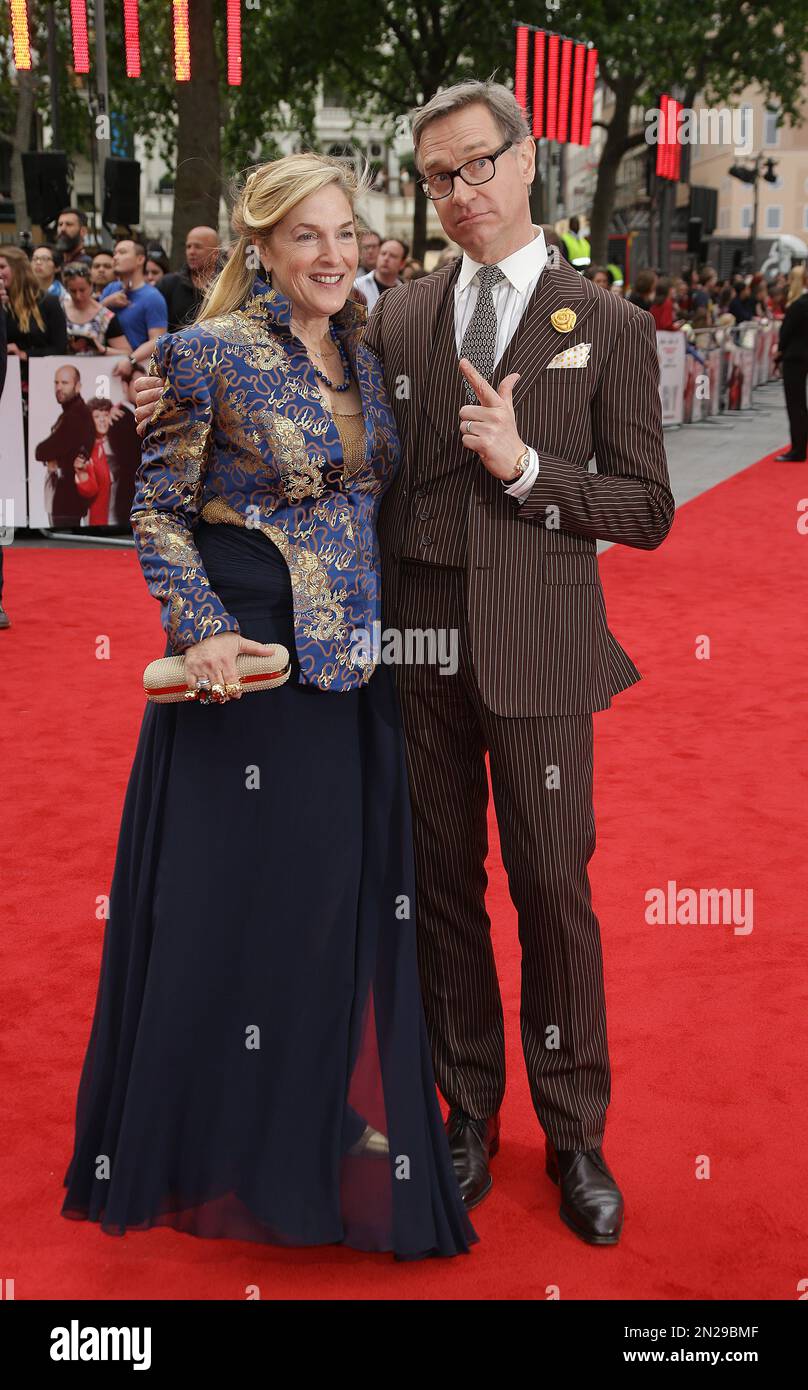 Director Paul Feig and wife Laurie Karon pose for photographers upon ...