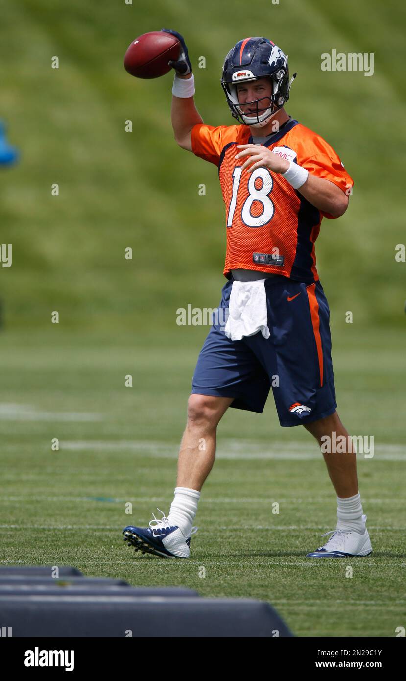 Denver Broncos quarterback Peyton Manning warms up during an NFL ...