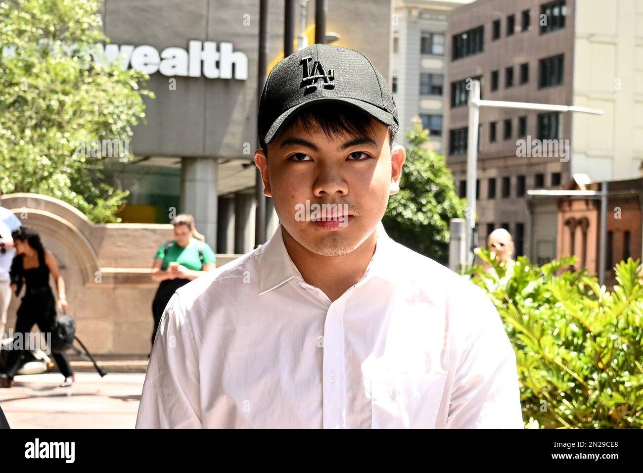 Dennis Su leaves the Downing Centre Local Court in Sydney, Tuesday ...