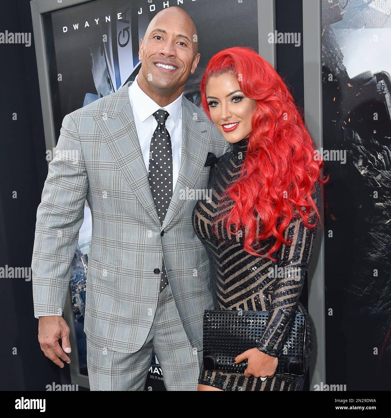 Dwayne 'The Rock' Johnson, left, and Eva Marie arrive at the World ...